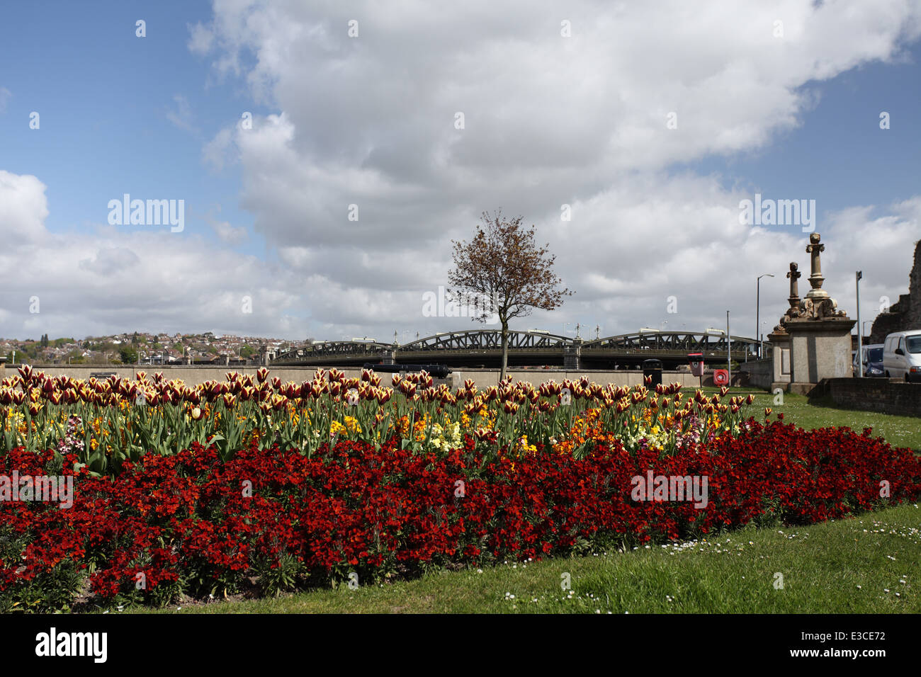 The colorful Rochester Esplanade with its cast iron bridge across the ...