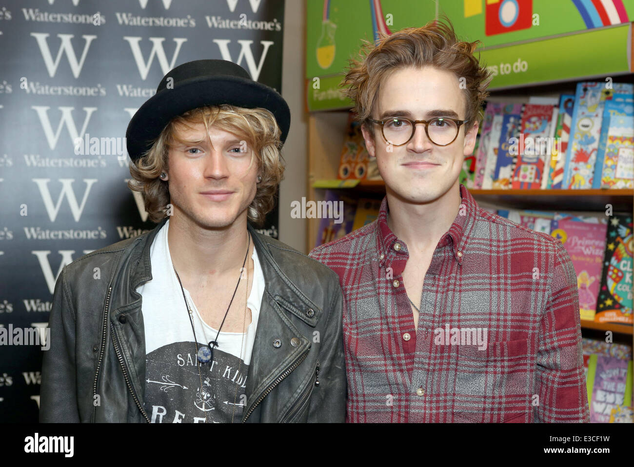 Dougie Poynter and Tom Fletcher, McFly Band members, sign copies of ...