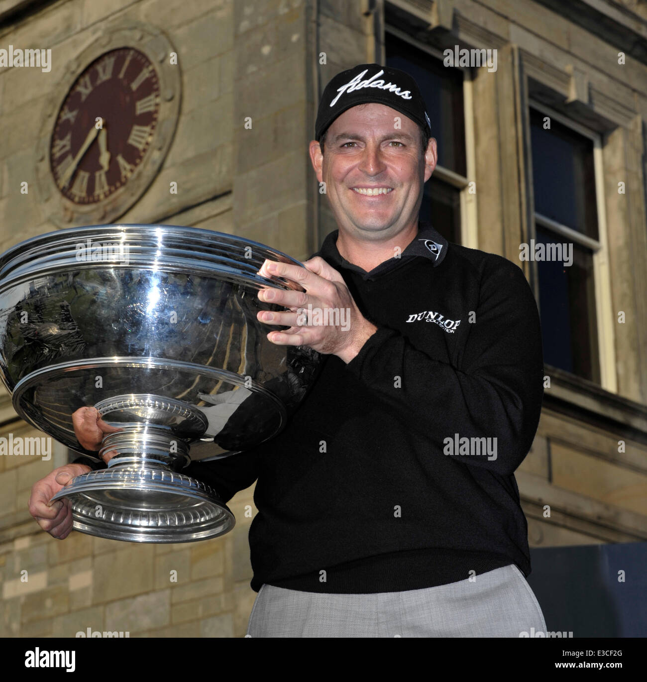 Champion David Howell the trophy at the end of the Alfred Dunhill Links ...
