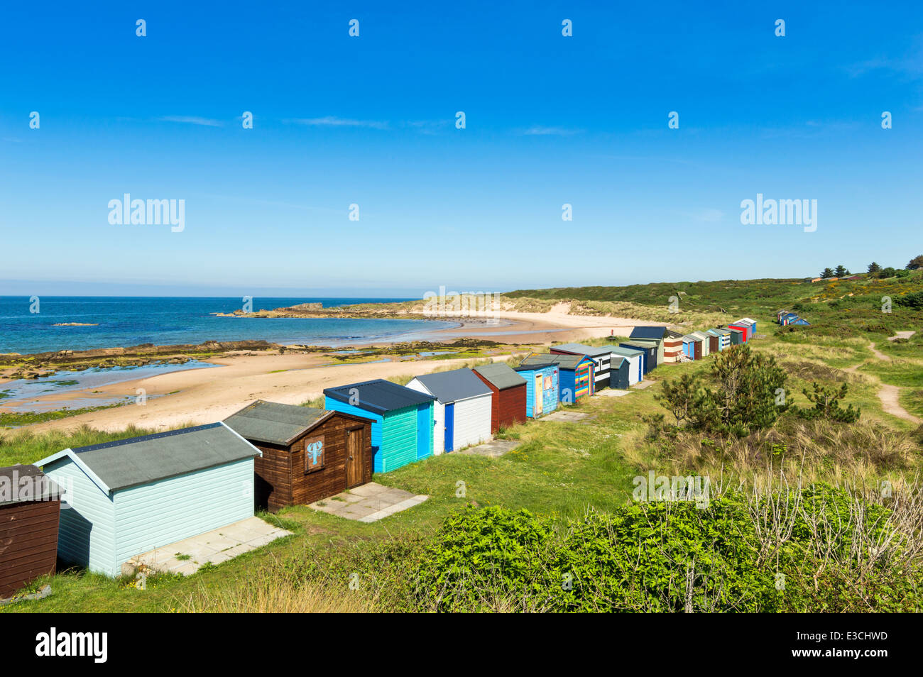 HOPEMAN BEACH WITH COLOURED BEACH HUTS OR CHALETS ON THE MORAY COAST OF ...