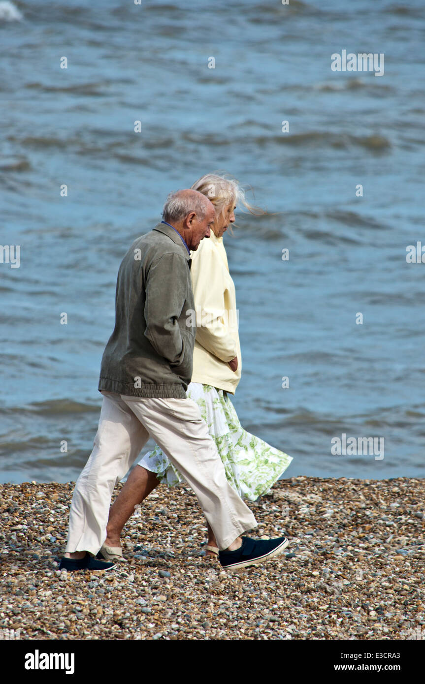 Old pensioner couple on beach Stock Photo - Alamy