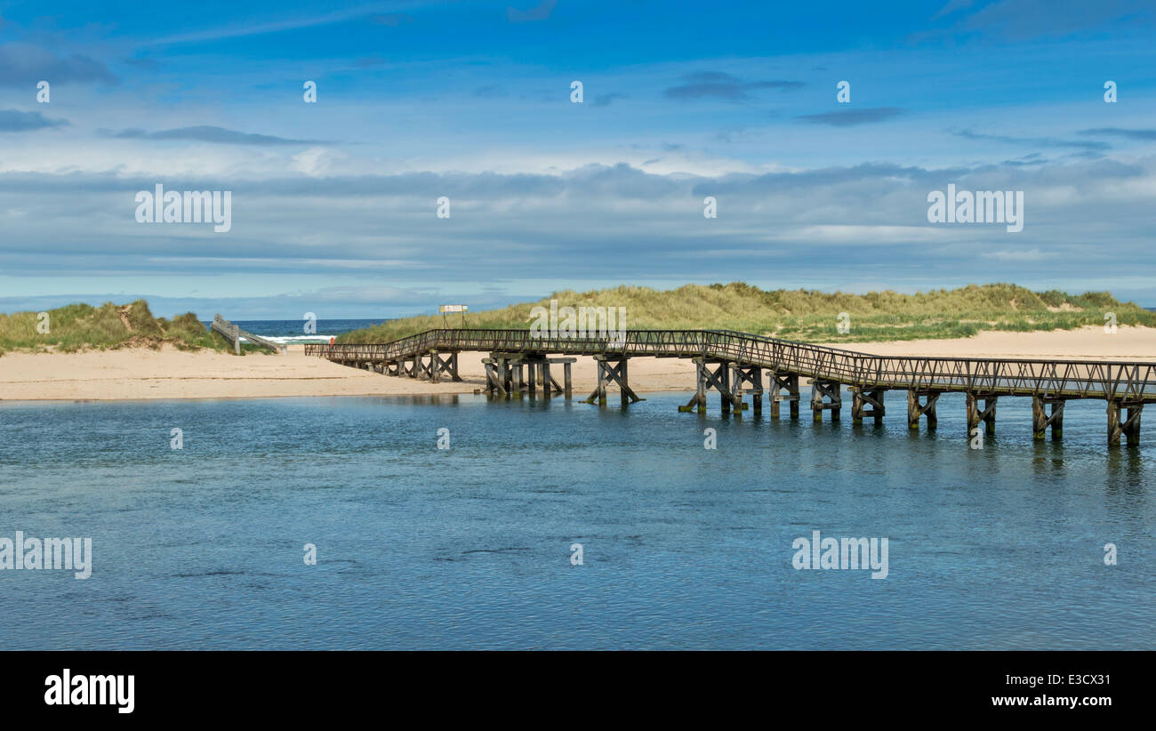 WOODEN PEDESTRIAN BRIDGE SPANNING THE RIVER LOSSIE AT LOSSIEMOUTH MORAY ...