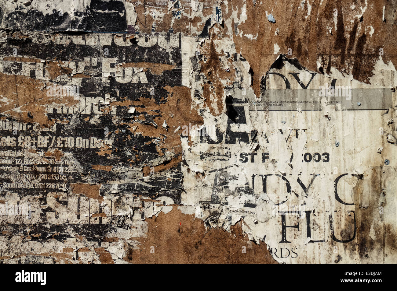 Worn posters on a wall in Edinburgh's Old Town Stock Photo - Alamy
