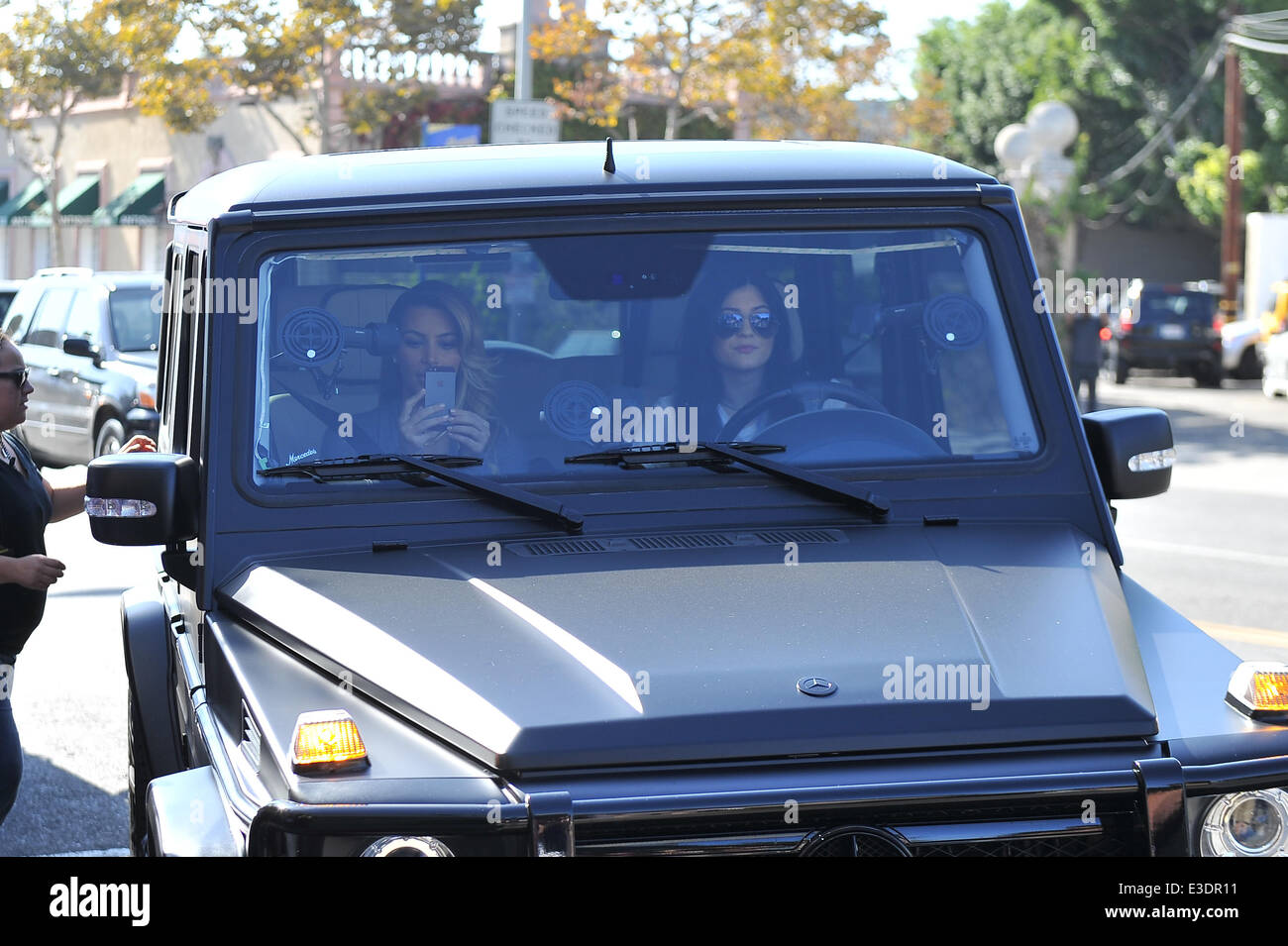 Kim Kardashian at the DASH boutique on melrose filming keeping up with ...