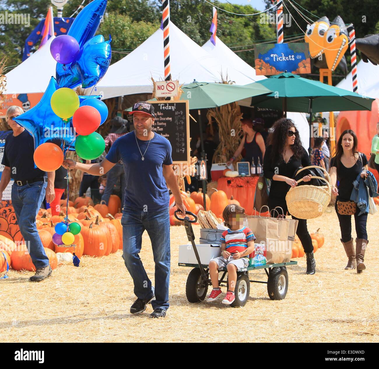 Tom Morello seen with his family at Mr. Bones Pumpkin Patch in West ...