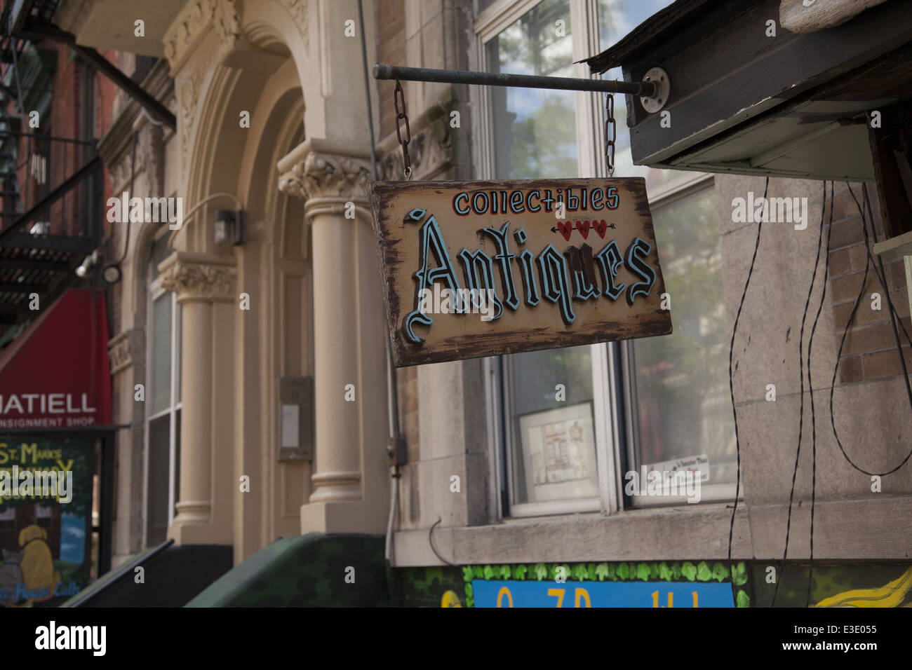 Antiques sign on an E.9th St. storefront in Greenwich Village, NYC ...