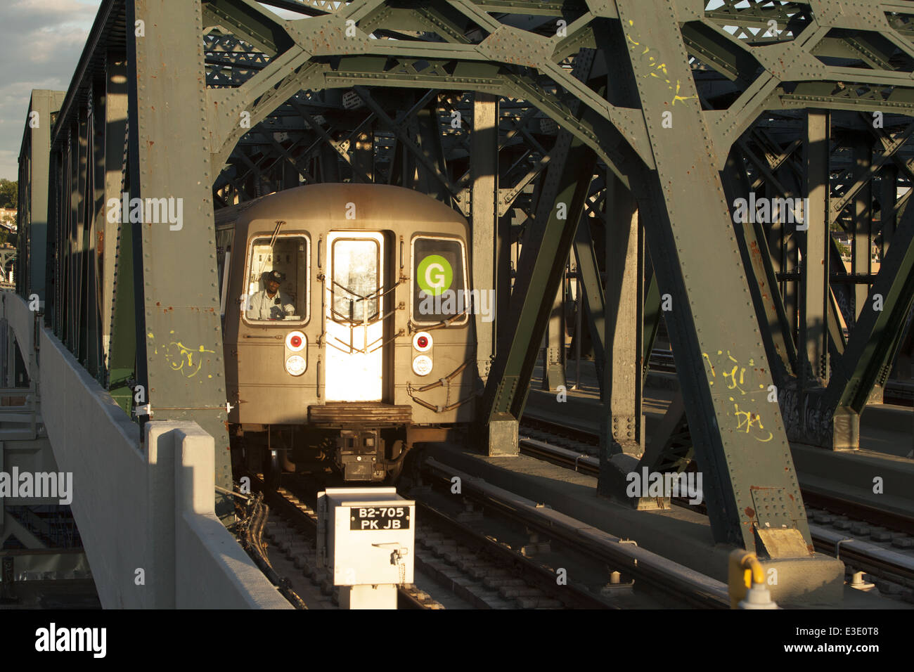 G Train enters the Smith/9th St. elevated subway station just before ...