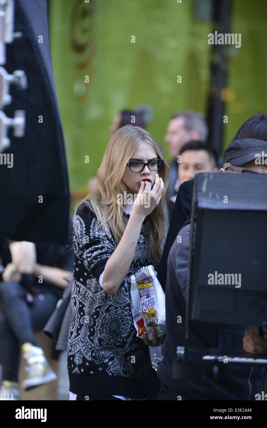 Cara Delevingne modelling on a photoshoot for Donna Karan's mainline ...