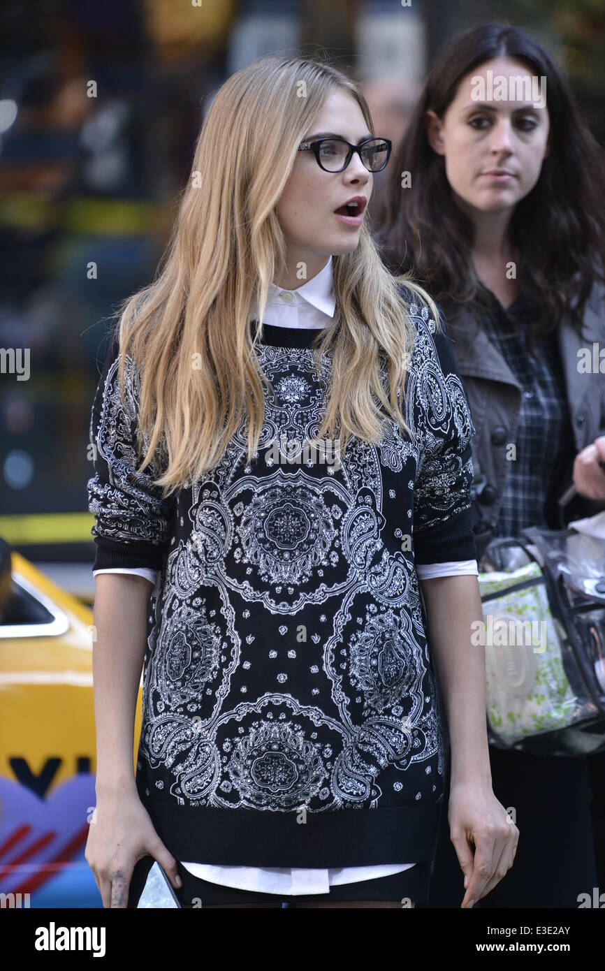 Cara Delevingne modelling on a photoshoot for Donna Karan's mainline ...