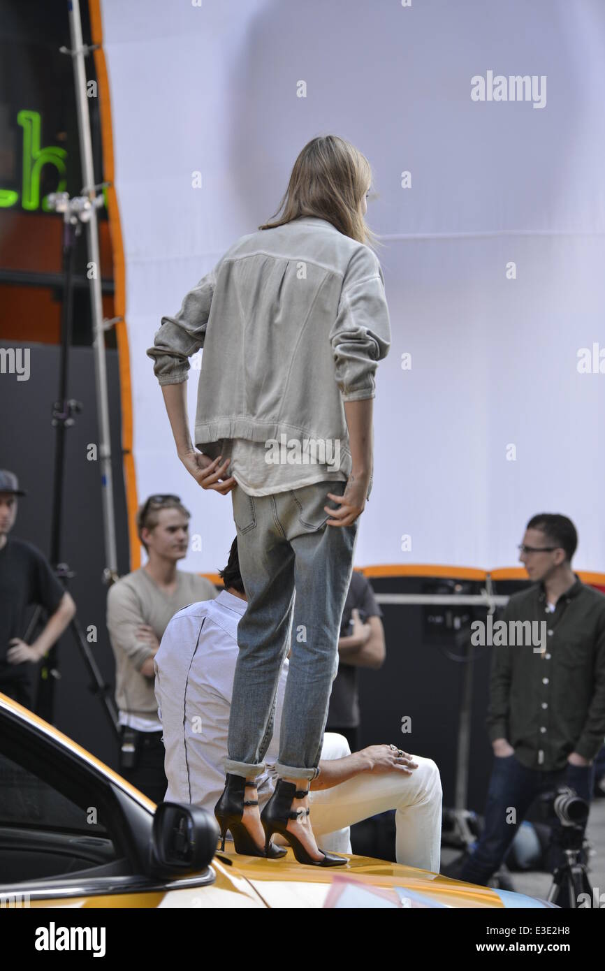 Cara Delevingne modelling on a photoshoot for Donna Karan's mainline ...