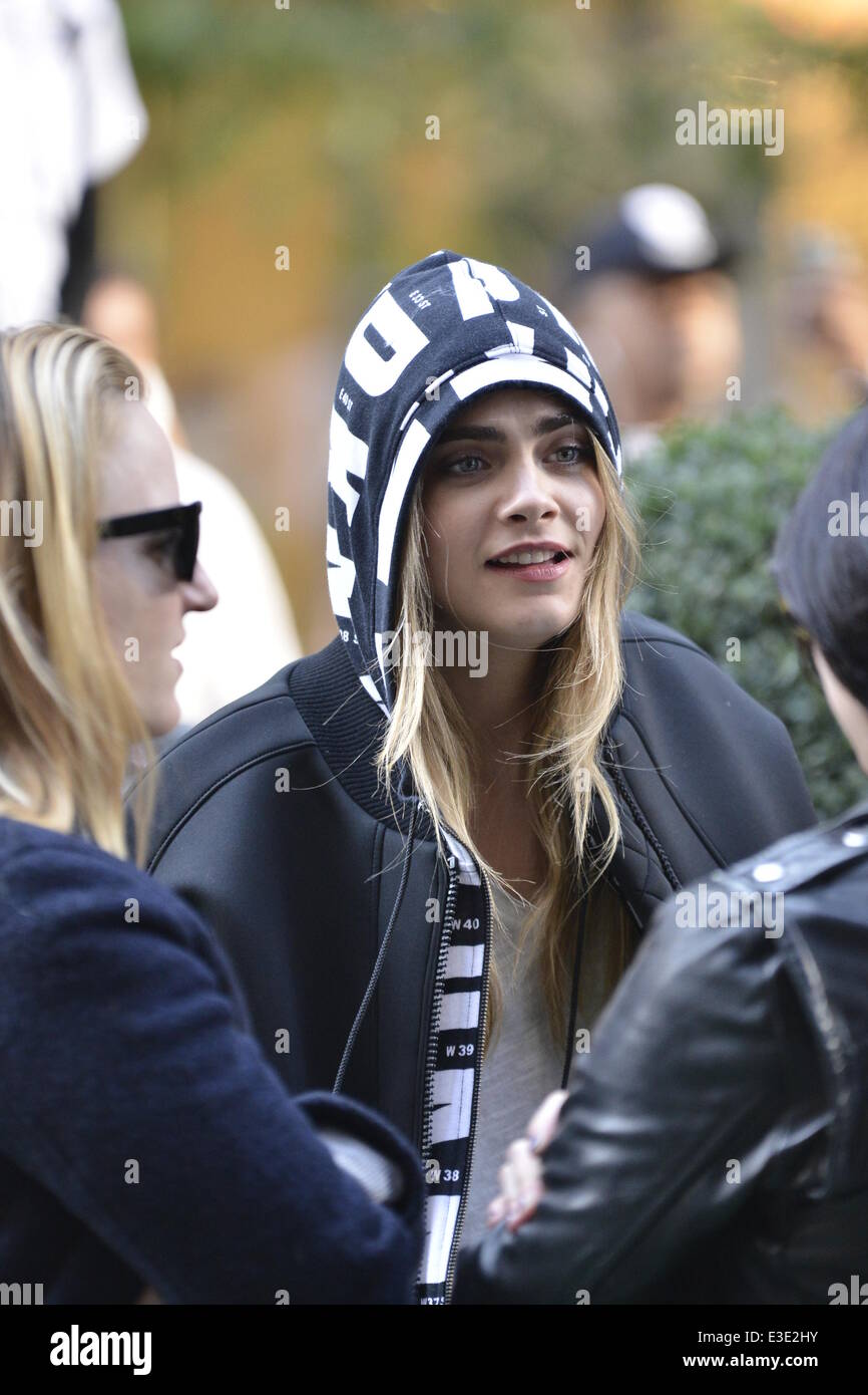 Cara Delevingne modelling on a photoshoot for Donna Karan's mainline ...