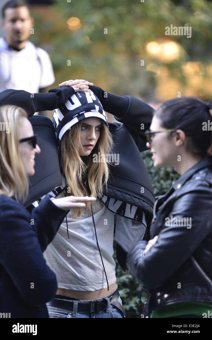 Cara Delevingne modelling on a photoshoot for Donna Karan's mainline ...