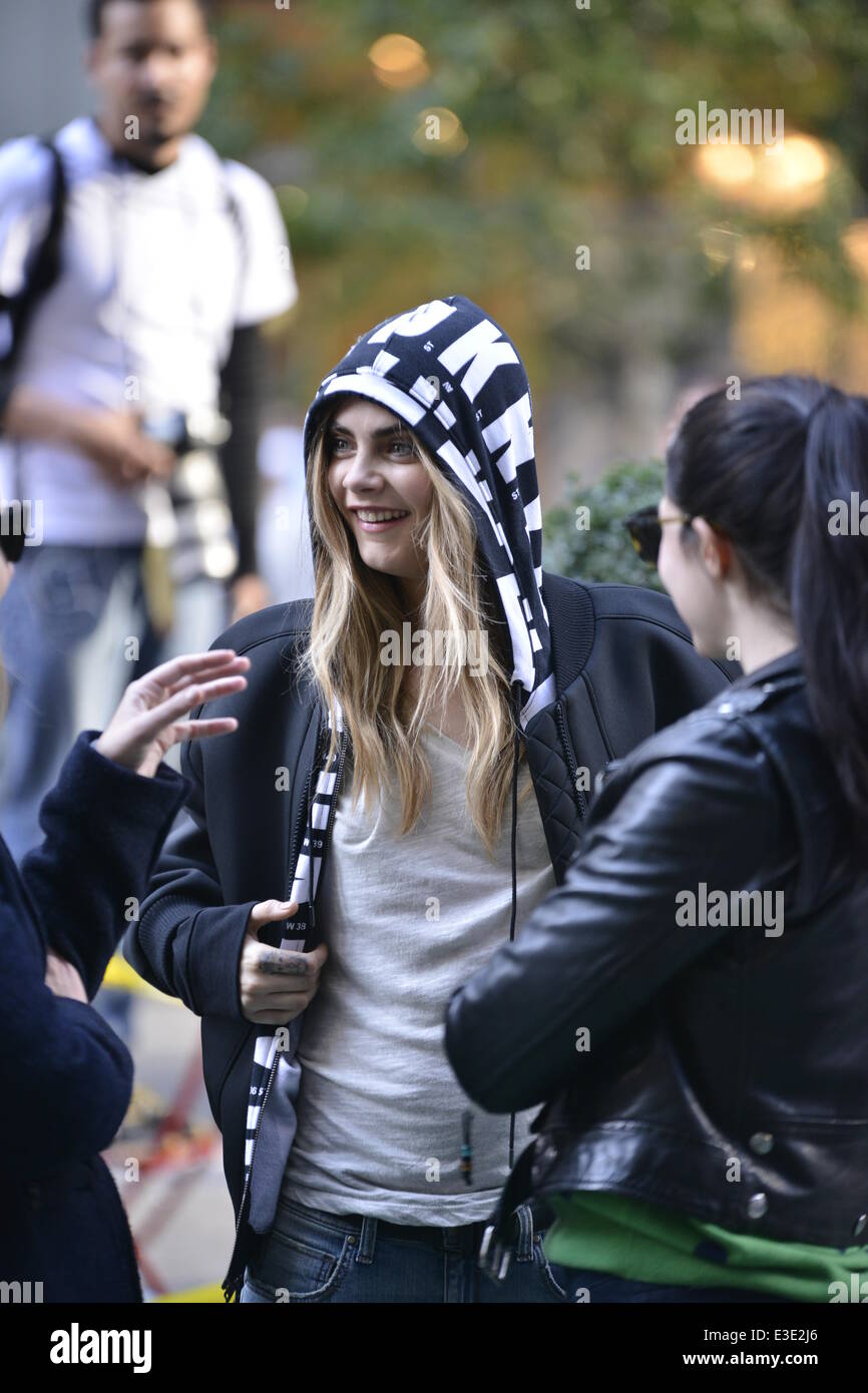 Cara Delevingne modelling on a photoshoot for Donna Karan's mainline ...