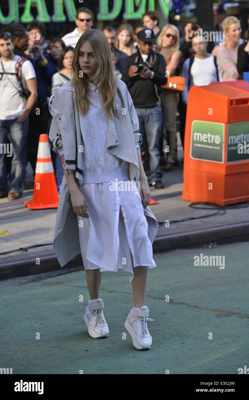 Cara Delevingne modelling on a photoshoot for Donna Karan's mainline ...