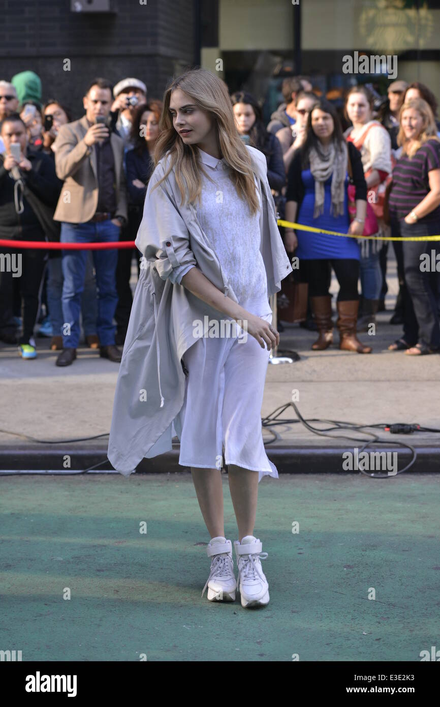 Cara Delevingne modelling on a photoshoot for Donna Karan's mainline ...