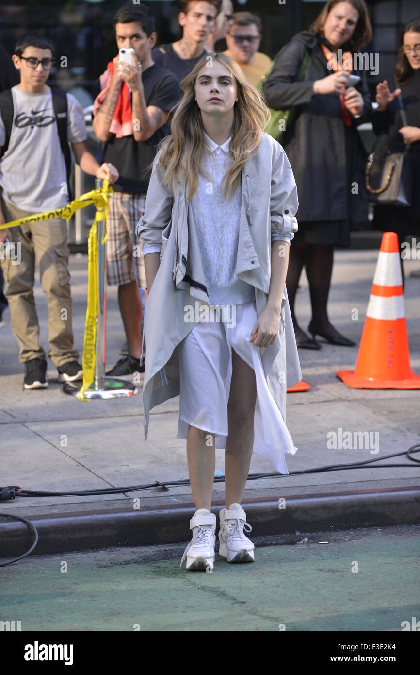 Cara Delevingne modelling on a photoshoot for Donna Karan's mainline ...