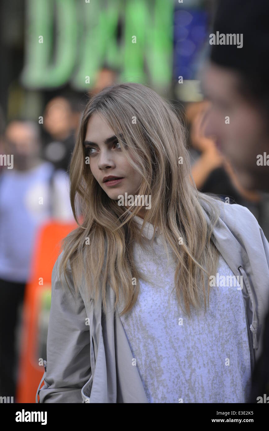 Cara Delevingne modelling on a photoshoot for Donna Karan's mainline ...