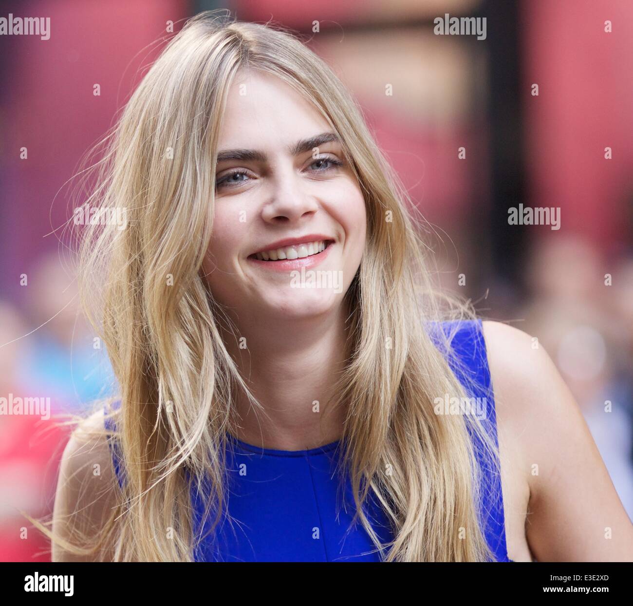 Model Cara Delevingne poses for photos at a DKNY photo shoot in Times ...