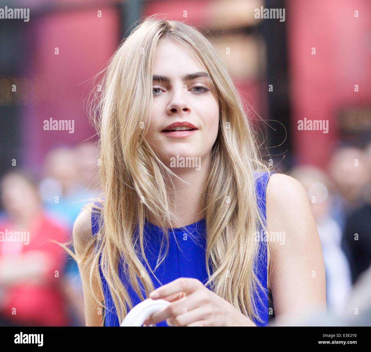 Model Cara Delevingne poses for photos at a DKNY photo shoot in Times ...