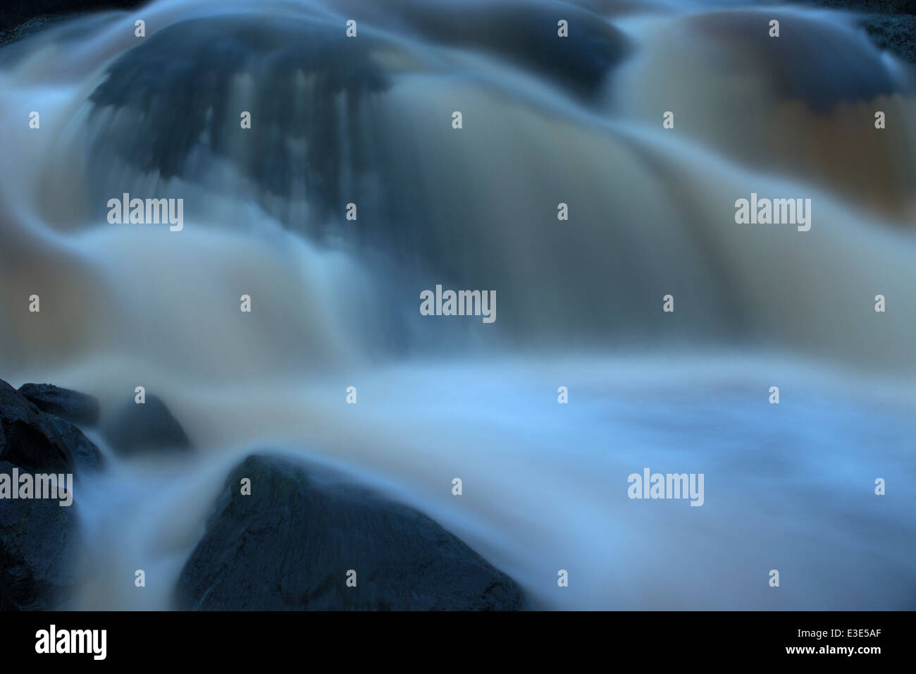 Water Splashing Between Stones in Waterfall Stock Photo - Alamy