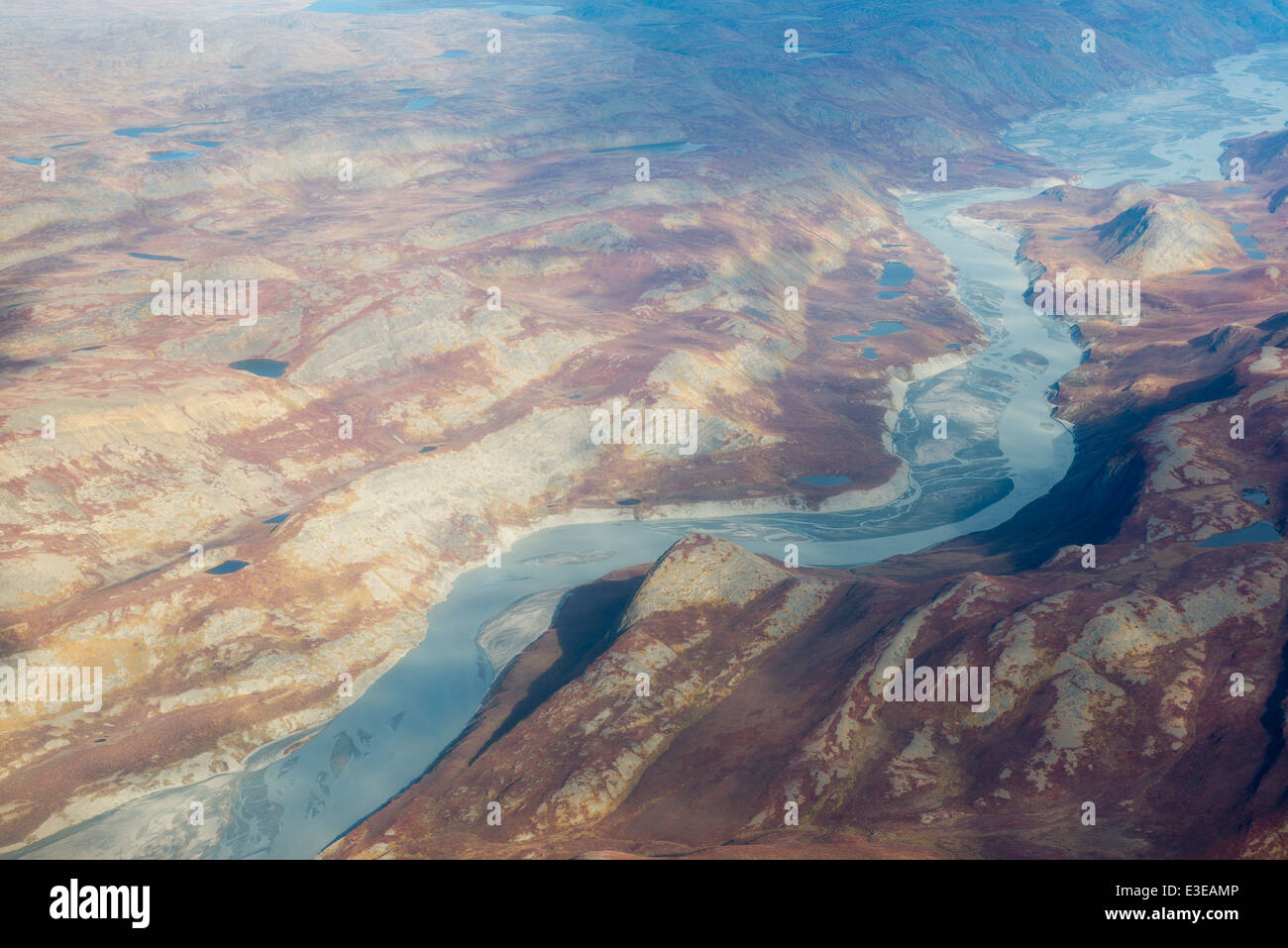 Landscape of Greenland seen from the air in summer with rocky surface ...