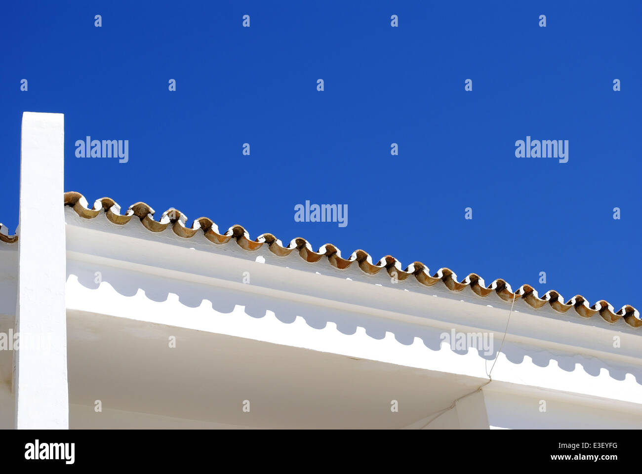 White wall and roof tiles Stock Photo - Alamy