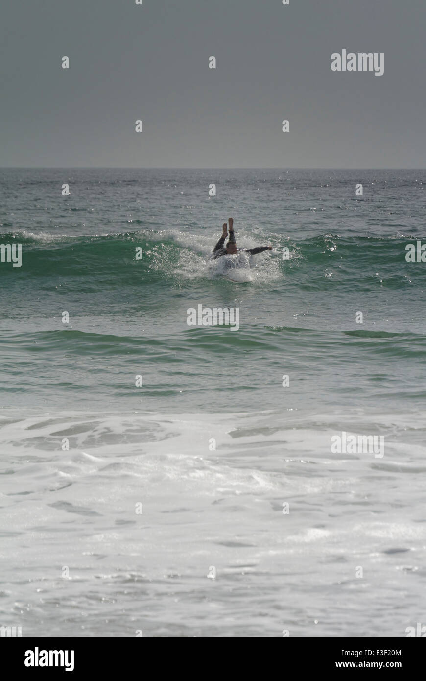 Surfing at Porth Neigwl [Hell's Mouth Bay, North Wales] in bright and ...