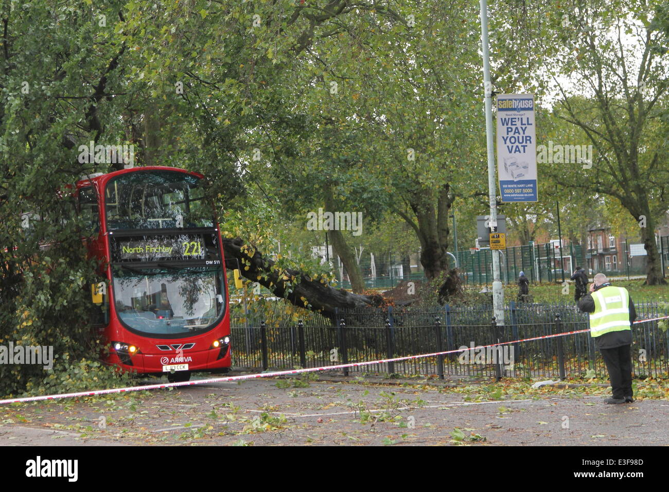 A one hundred year old tree crashes on top of a 221 bus on Wood Green ...