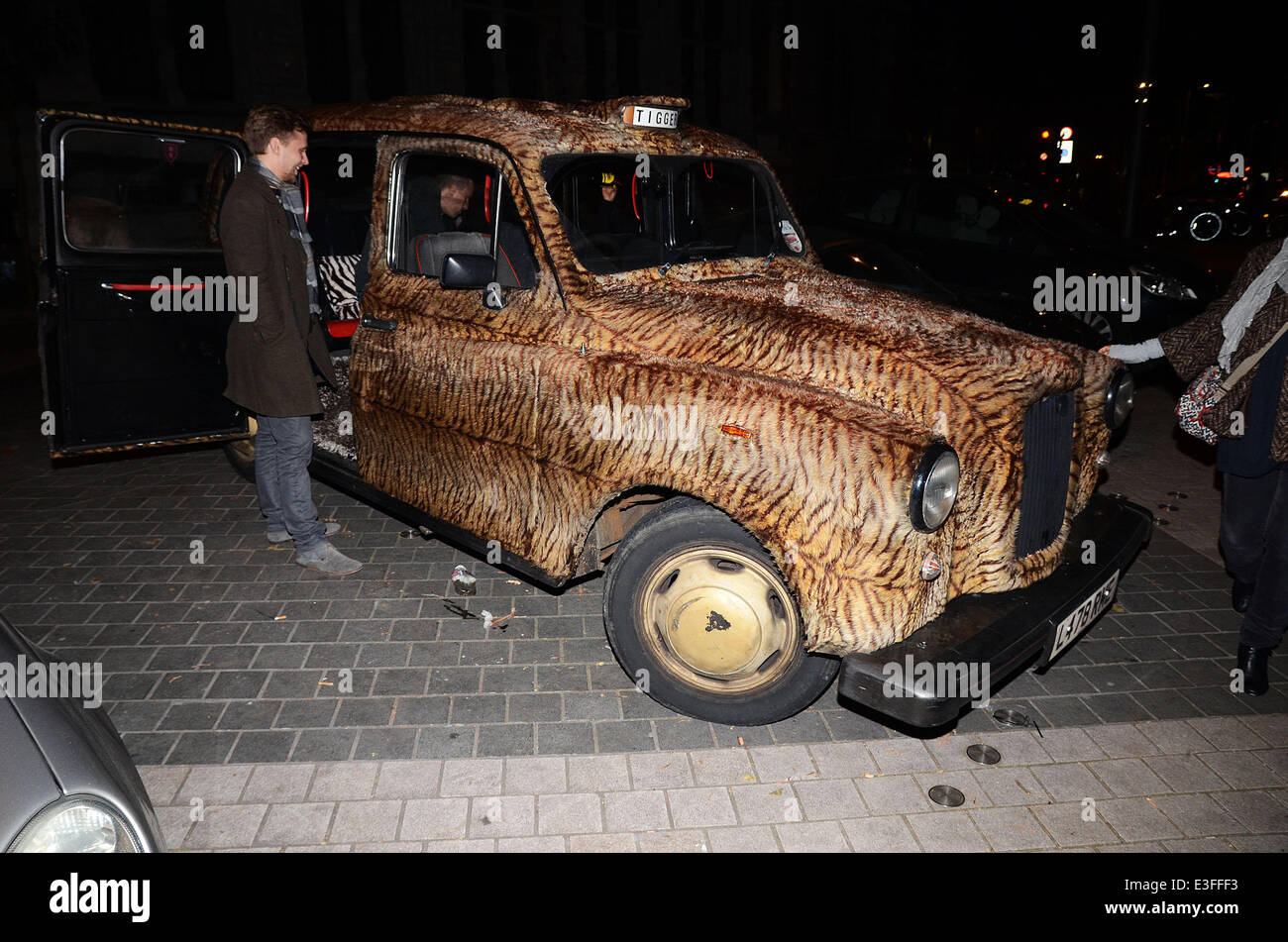 Is it Taxidermy? London Taxi cab,has been covered in Tiger fur and even ...
