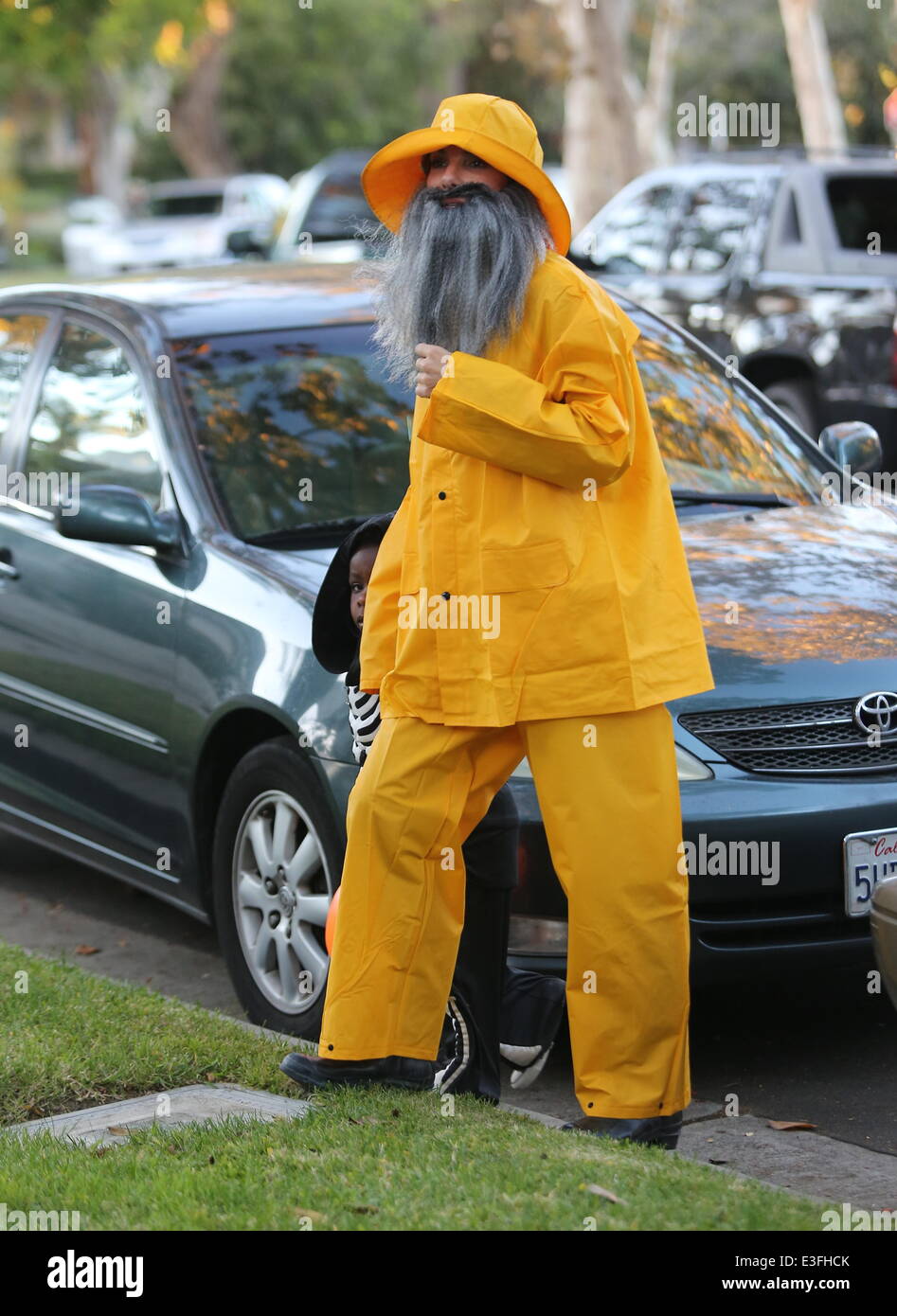Sandra Bullock dressed as a fisherman, complete with grey beard and ...