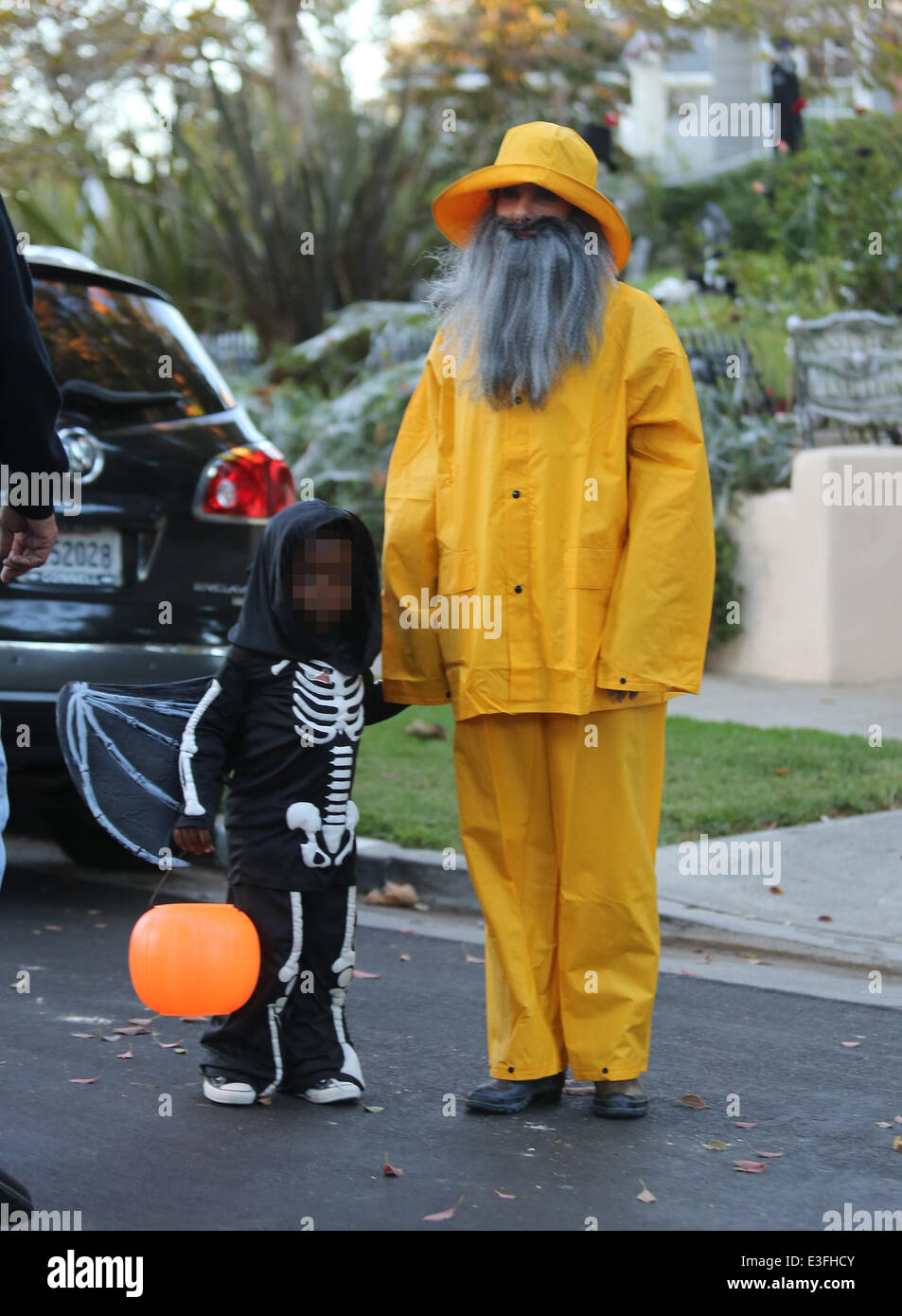 Sandra Bullock dressed as a fisherman, complete with grey beard and ...