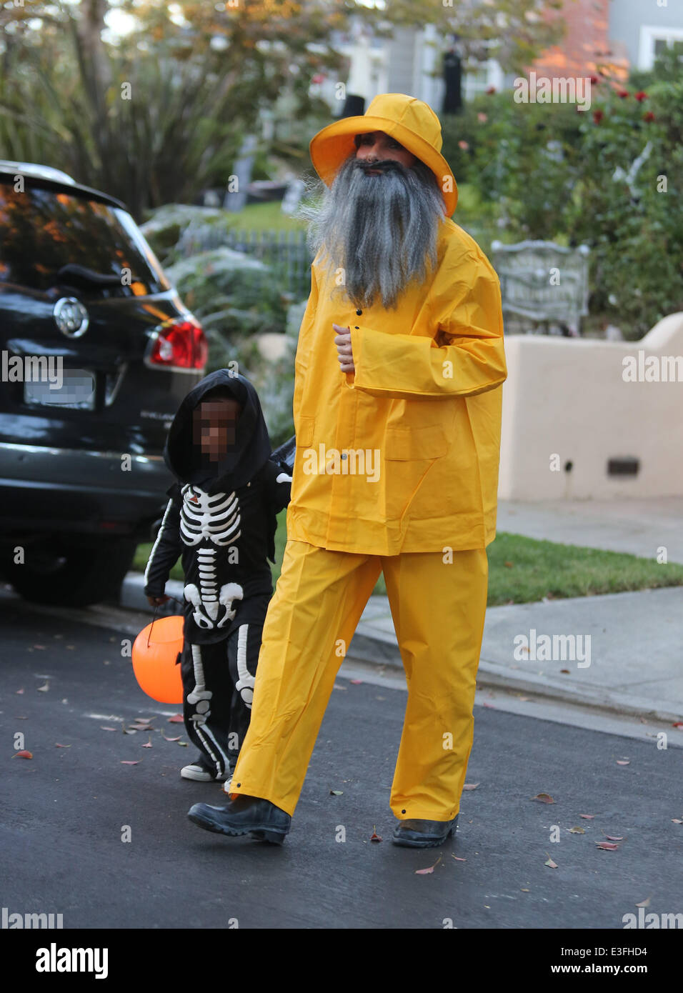 Sandra Bullock dressed as a fisherman, complete with grey beard and ...