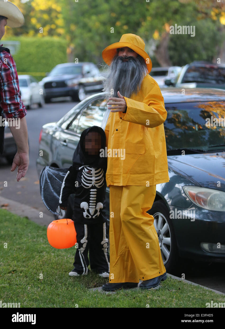 Sandra Bullock dressed as a fisherman, complete with grey beard and ...