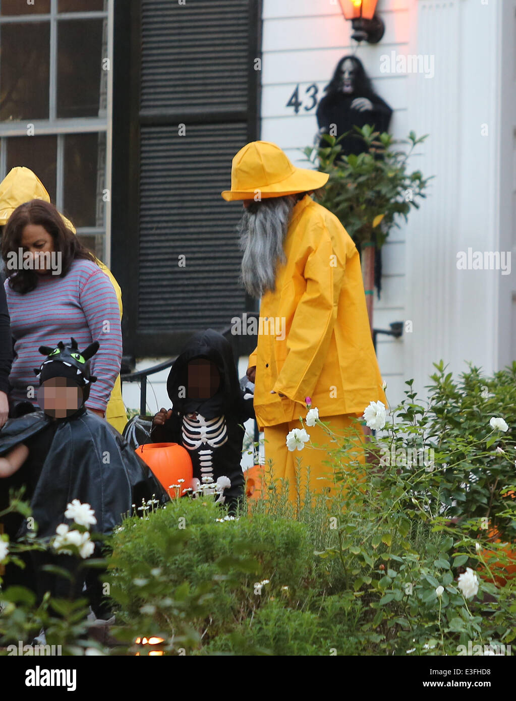 Sandra Bullock dressed as a fisherman, complete with grey beard and ...