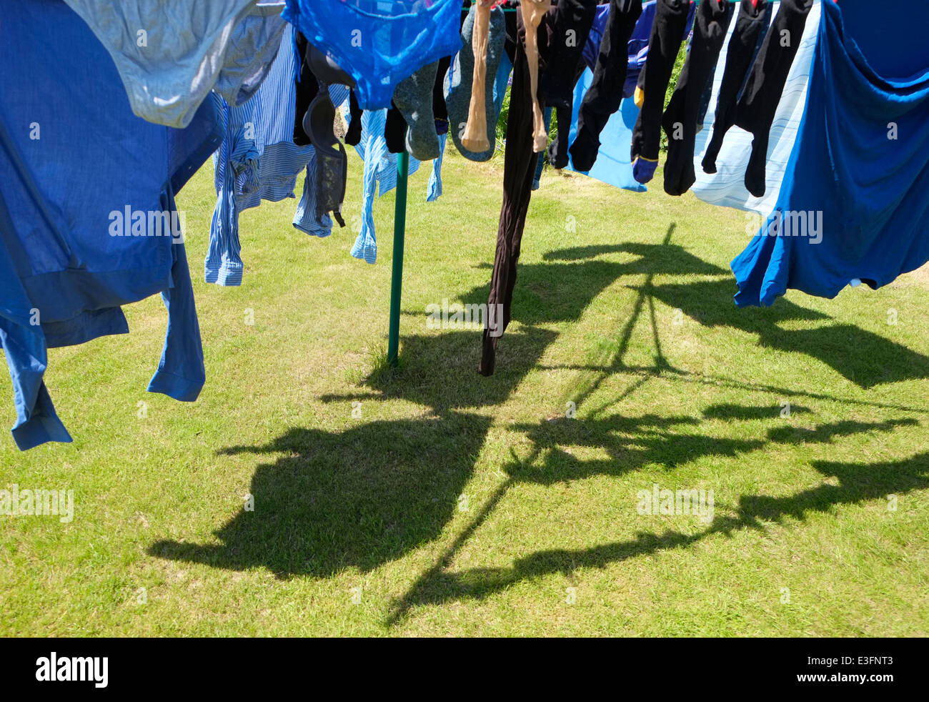 Shadows of washing blowing in the wind Stock Photo - Alamy