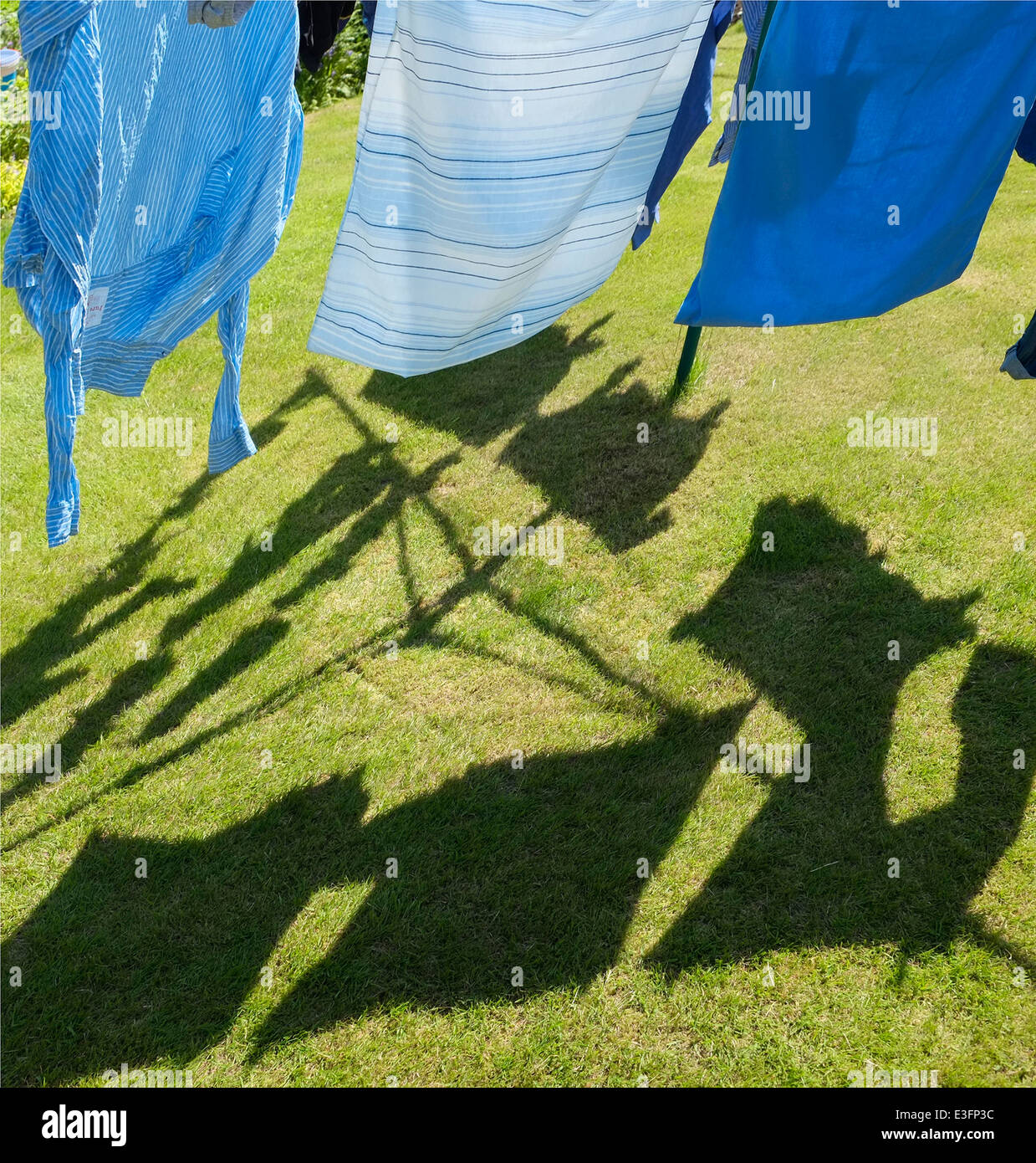 Shadows of washing blowing in the wind Stock Photo - Alamy