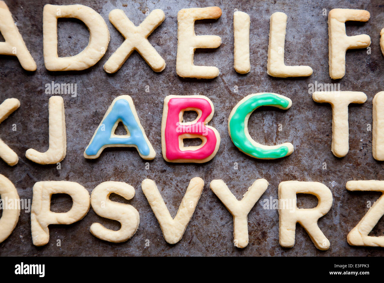 Decorated cookies ABC on baking tray, close-up Stock Photo - Alamy