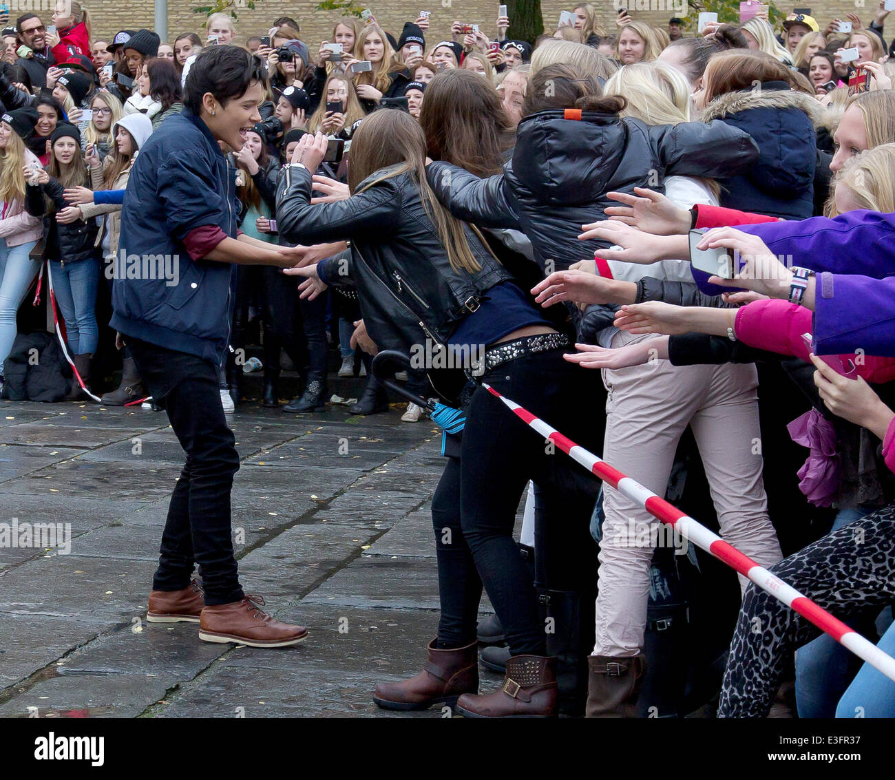Swedish boyband The Fooo perform a surprise gig in front of fans in ...