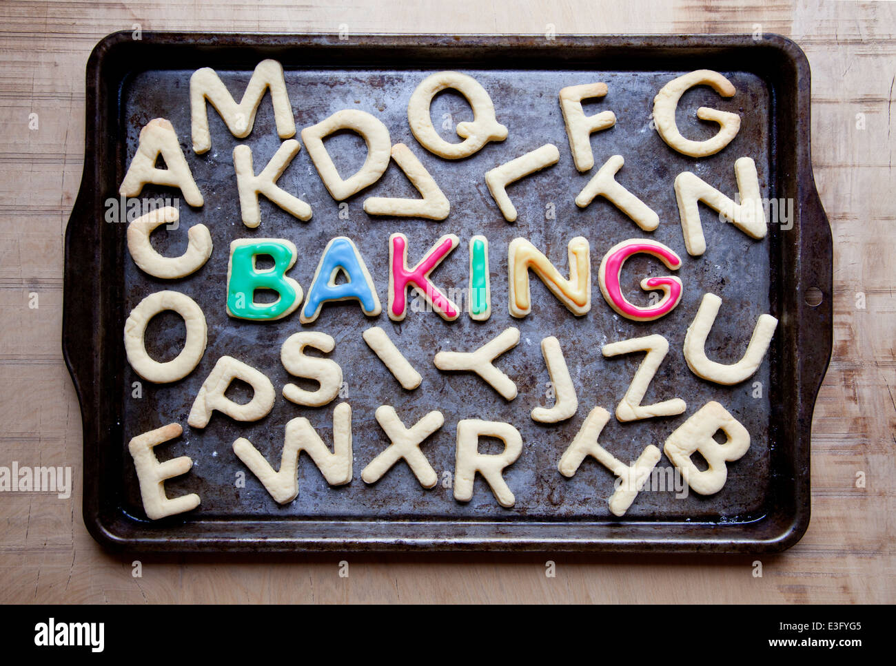 Decorated cookies BAKING on baking tray Stock Photo - Alamy