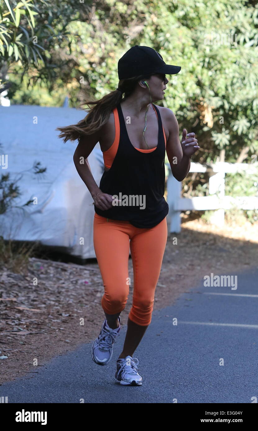 Eva Longoria goes for a morning run in Los Angeles wearing orange ...
