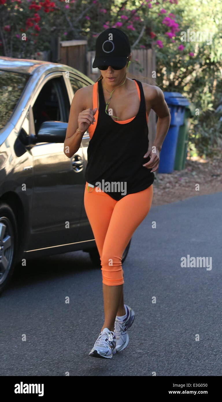 Eva Longoria goes for a morning run in Los Angeles wearing orange ...