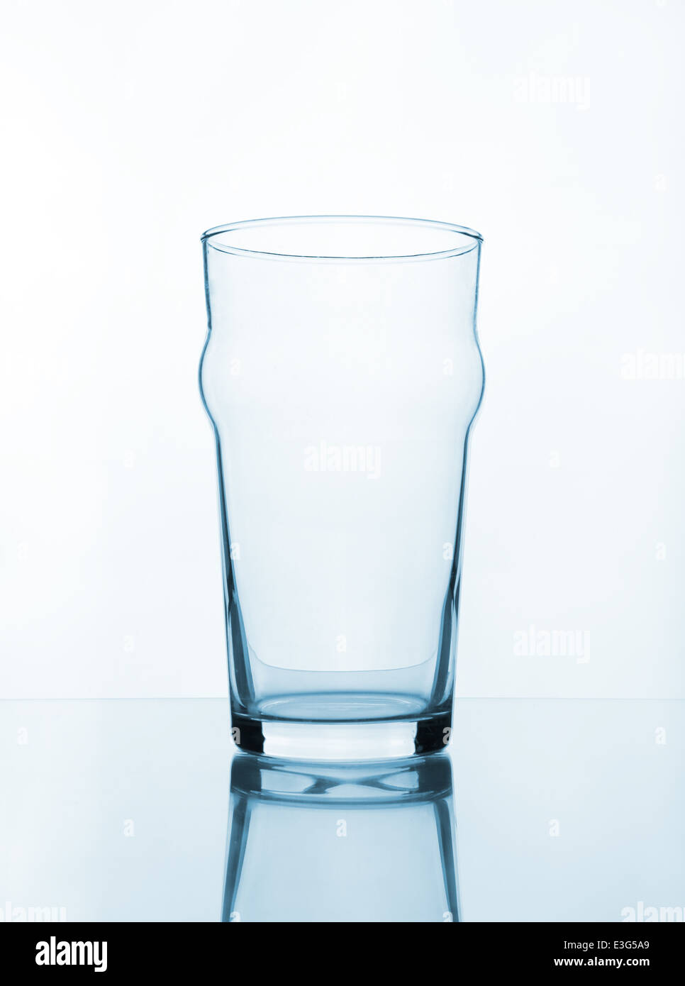 empty glass on glass table Stock Photo - Alamy