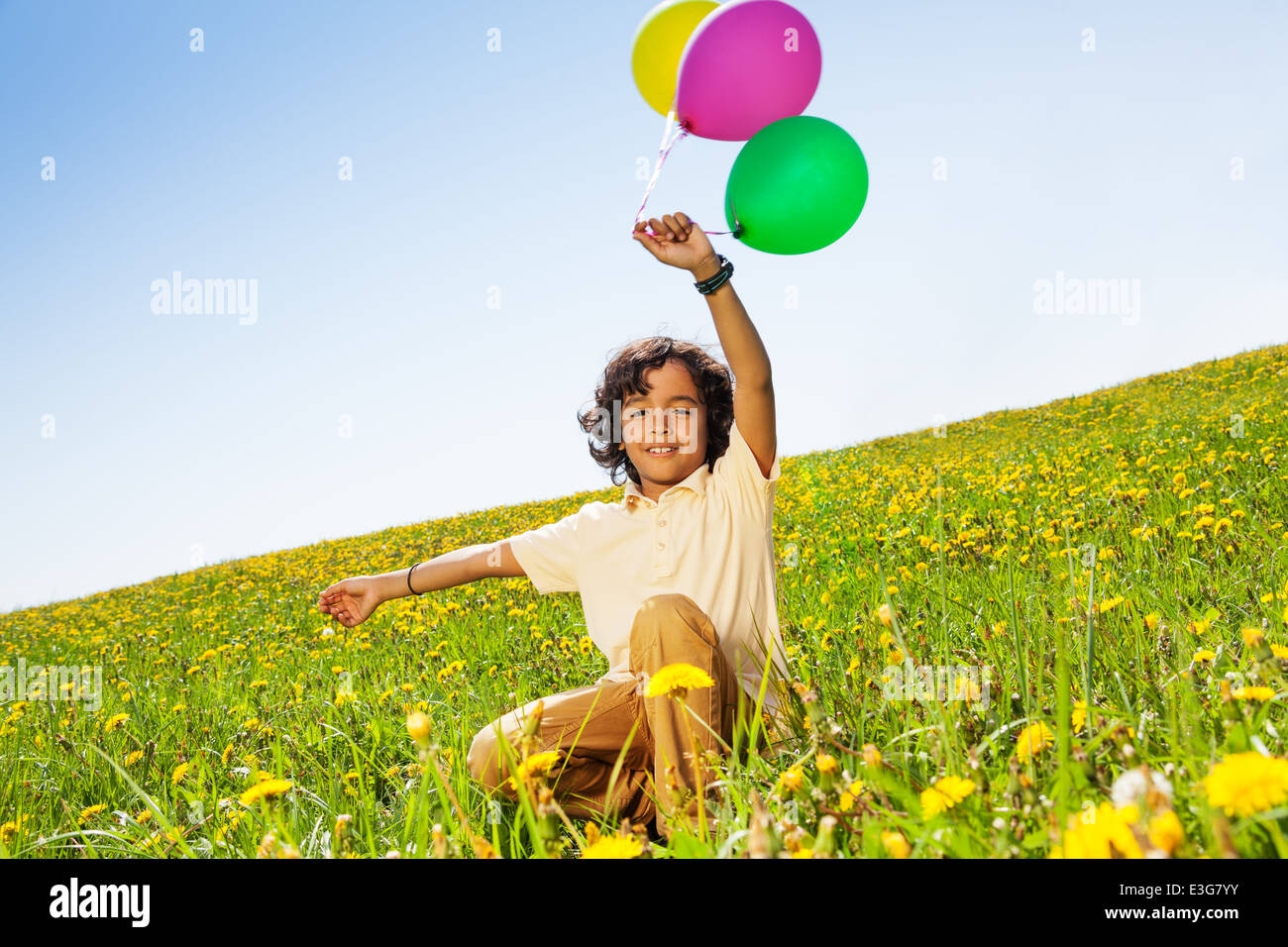 Sky balloons children flying hi-res stock photography and images - Alamy