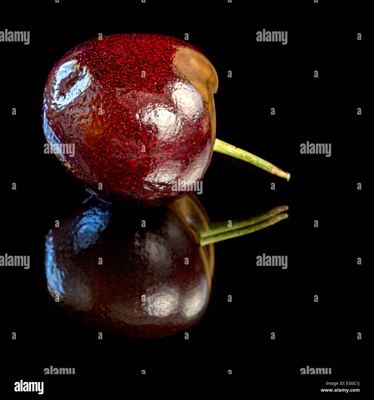 Single cherry with a step Stock Photo - Alamy