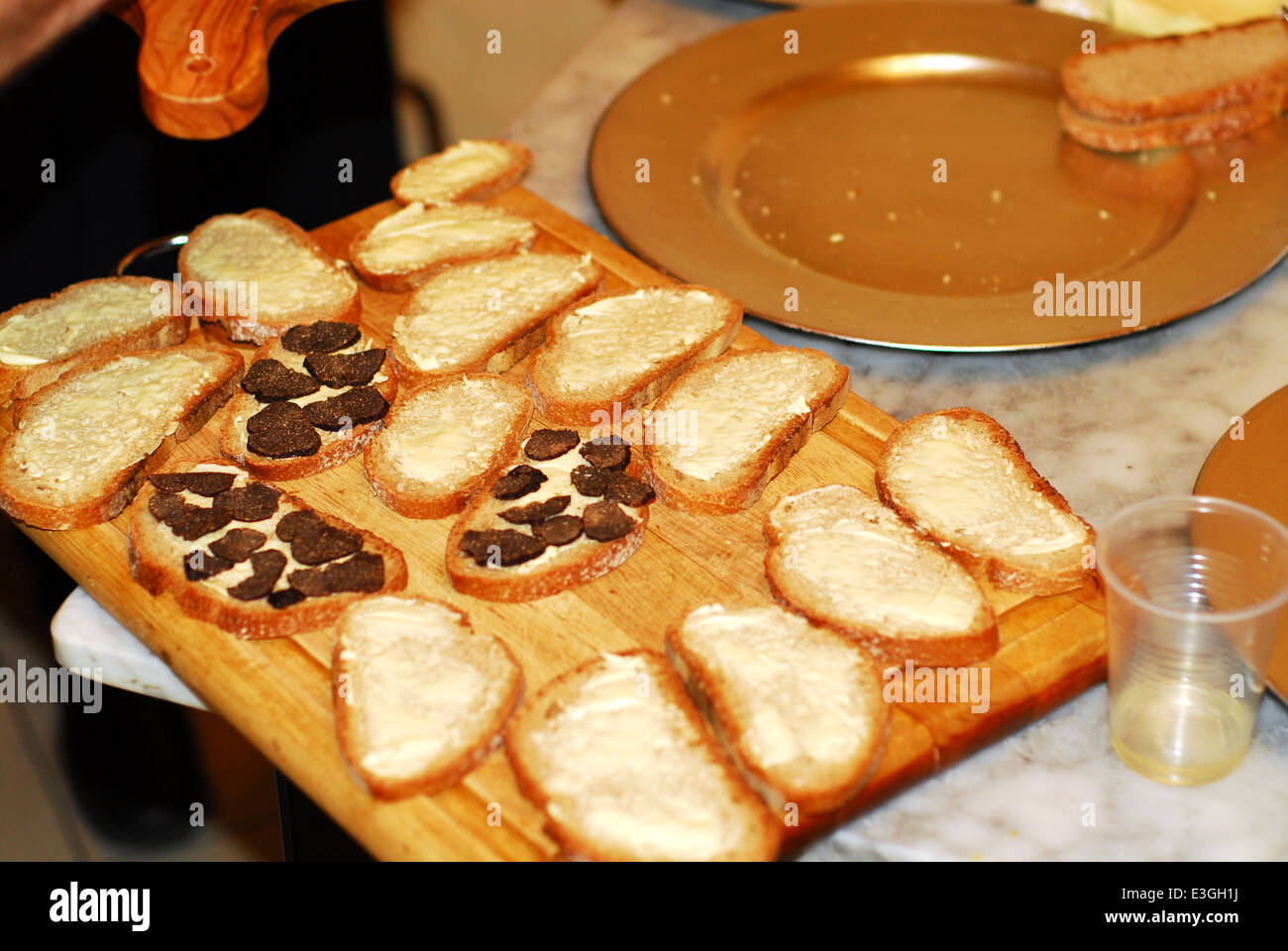 Preparation of truffle canapés Stock Photo - Alamy