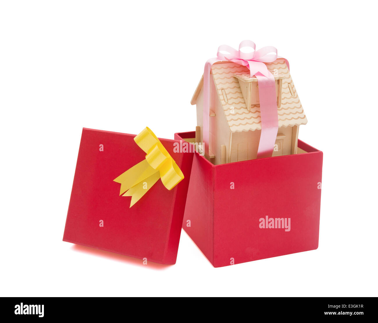 house wrapped with ribbon in a present box with clipping path Stock ...
