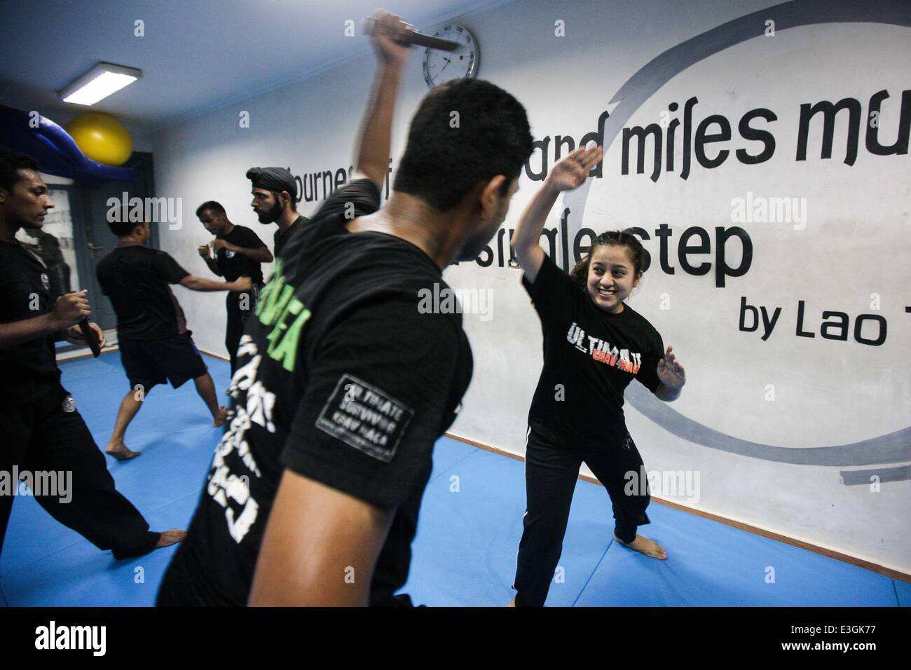 New Delhi, India. 22nd June, 2014. A girl learns self defence skills at ...