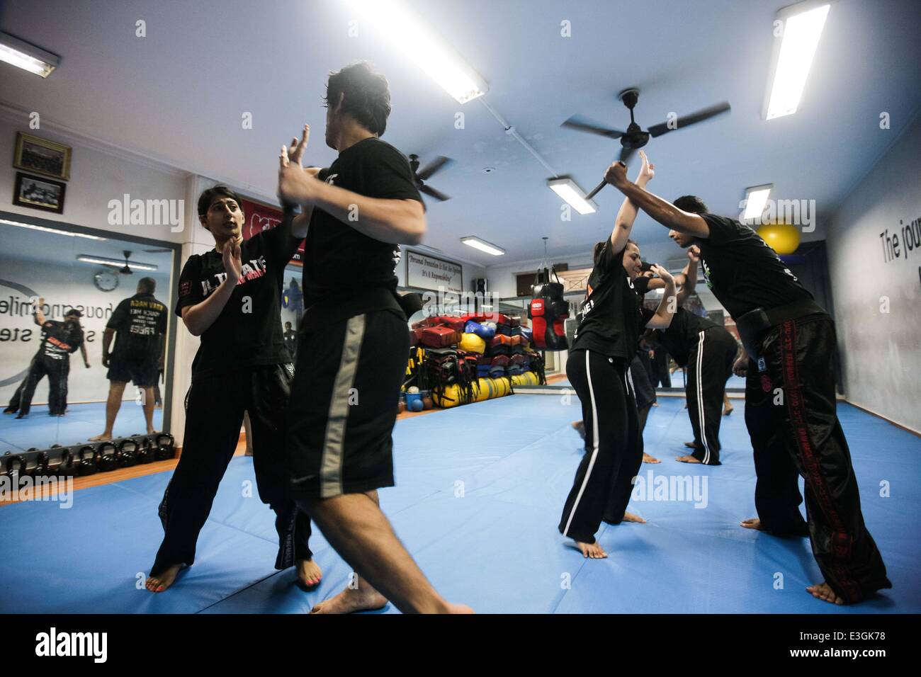New Delhi, India. 22nd June, 2014. Girls learn self defence skills at ...