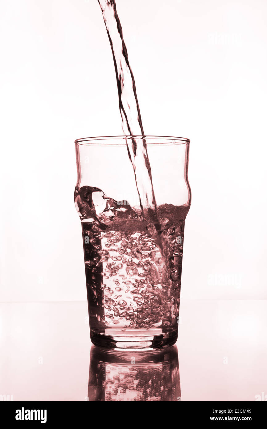 Pouring red water on ice hi-res stock photography and images - Alamy