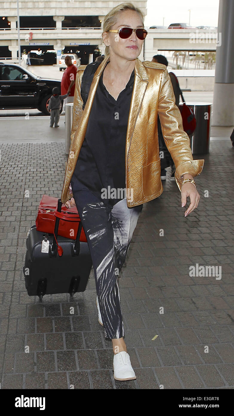 'Basic Instinct' actress Sharon Stone departs from LAX with a friend ...